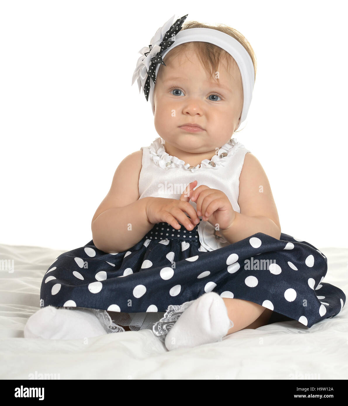 Beautiful baby in cute dress Stock Photo - Alamy