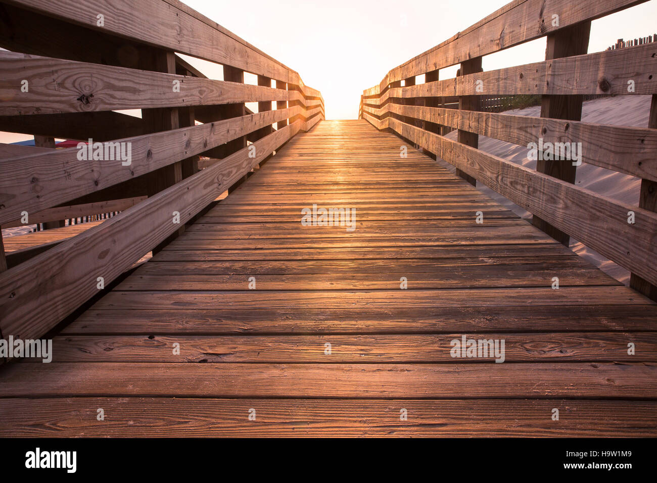 wooden beach walkway towards sunlight Stock Photo - Alamy