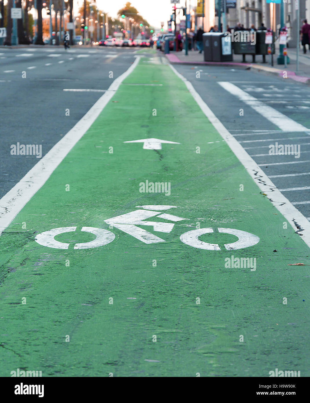 bike lane painted in green and traffic jam in background Stock Photo ...