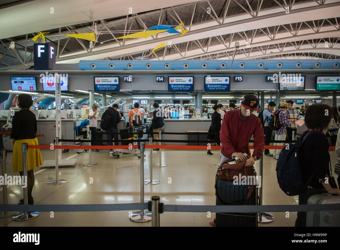 Osaka, Japan - November 2016: Passengers at JAL, Japan Airlines, check ...