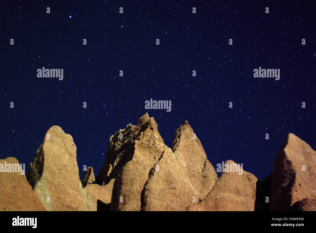 This image captures the Cedar Pass Formations under a starlit sky in ...