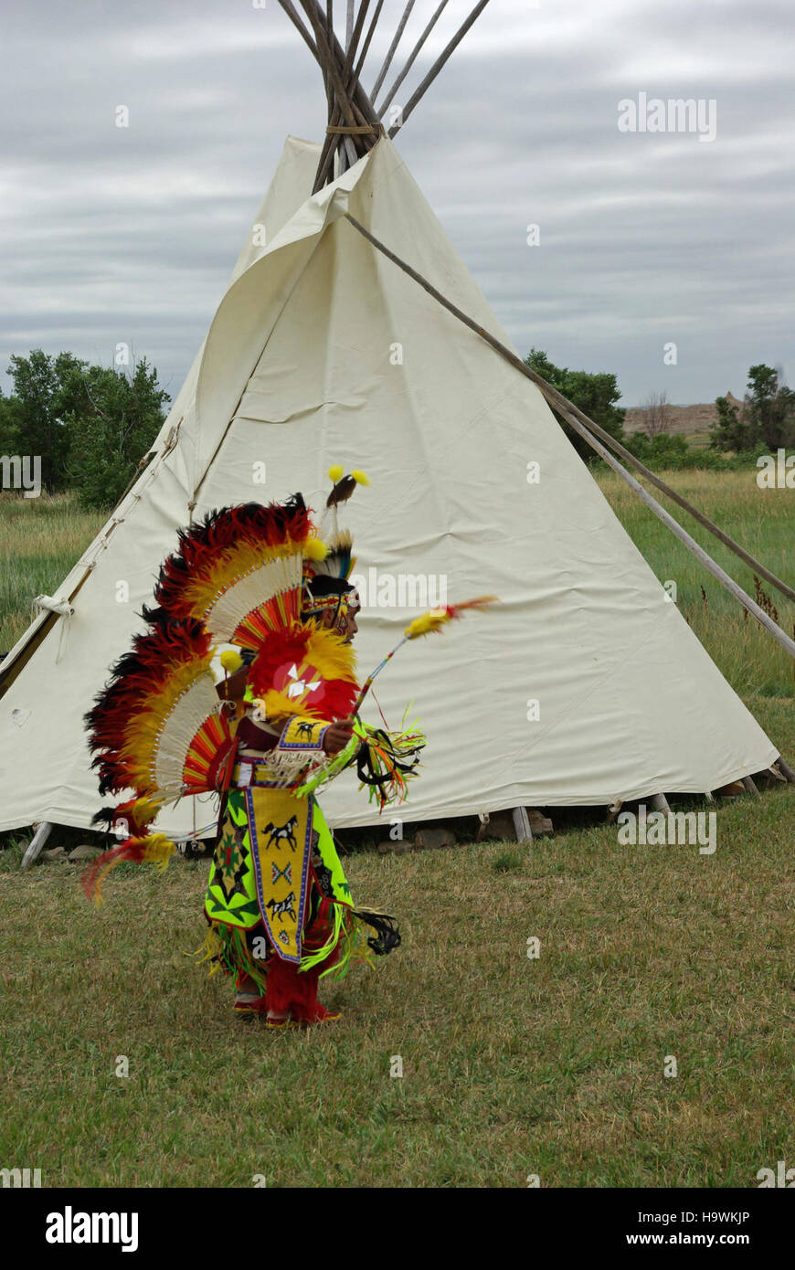 A Native American dancer performs the Fancy Dance at Badlands National ...