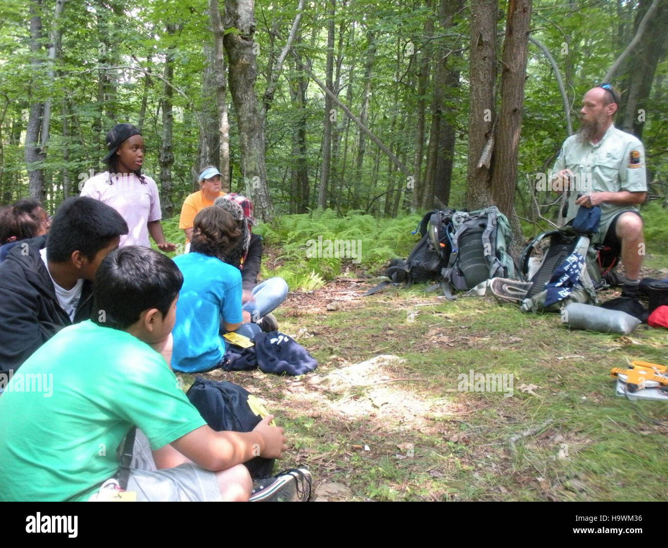 This photo captures a Ridge Runner sharing details about his gear in a ...