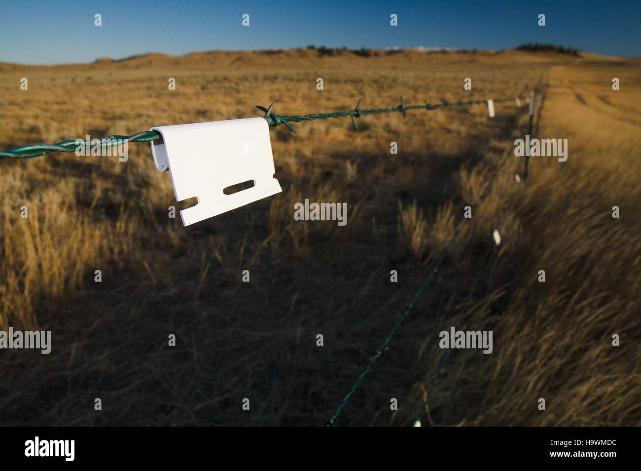 Clip-on plastic reflective fence markers are being used in national ...