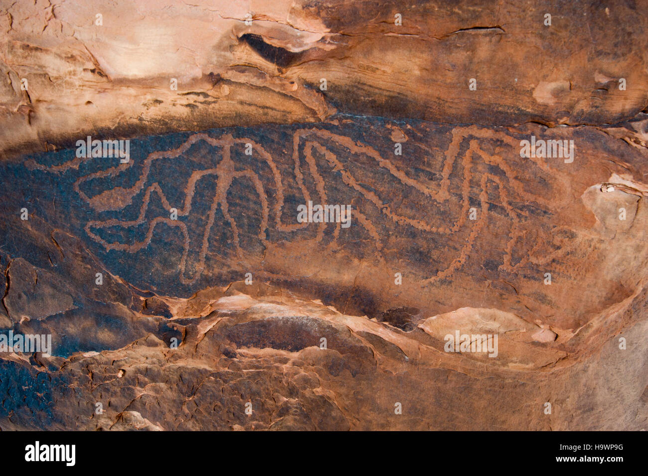 The Courthouse Wash Rock Art Panel in Arches National Park features ...
