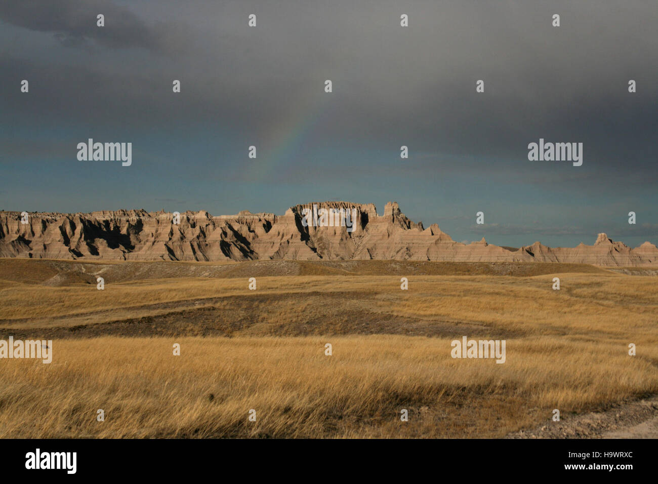 A rainbow stretches across the Stronghold Unit of Badlands National ...