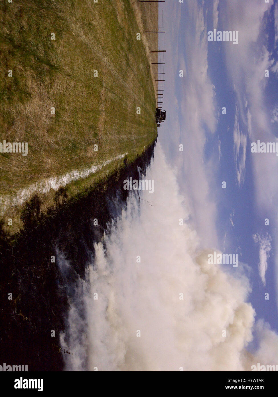This image shows a prescribed burn in Badlands National Park in April ...
