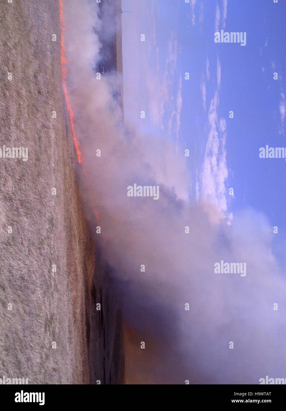 A prescribed burn conducted in Badlands National Park as part of ...