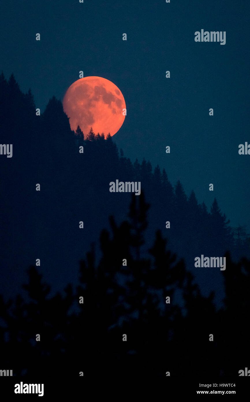 Moonrise over glacier national hi-res stock photography and images - Alamy