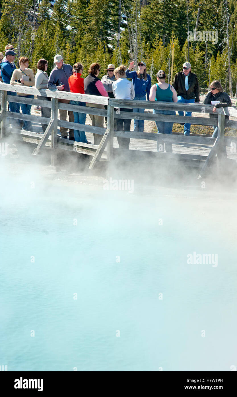 Visitors participate in a ranger-led program at Yellowstone National ...