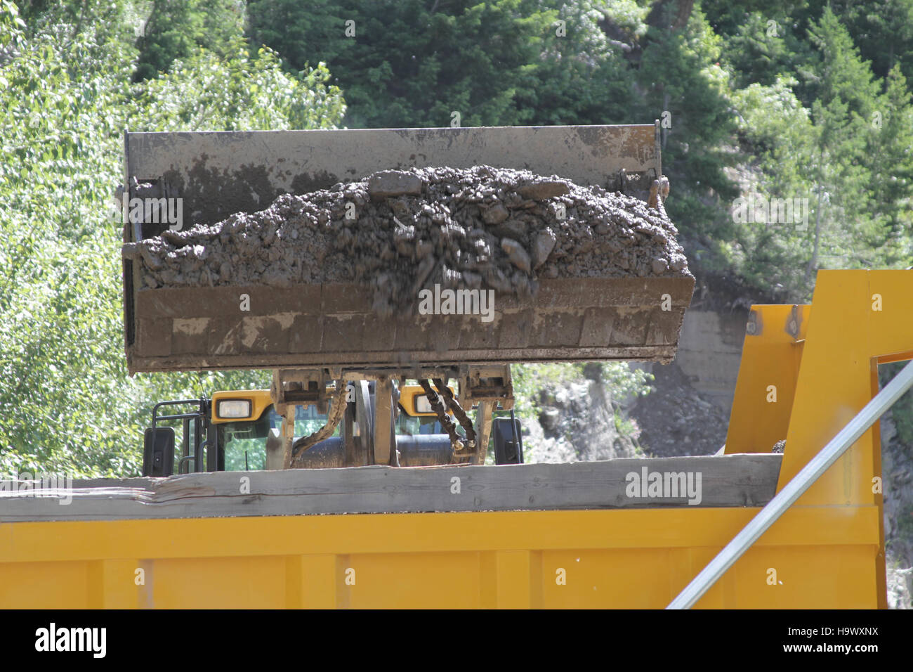 This photograph captures a rock slide on the Going-to-the-Sun Road, a ...