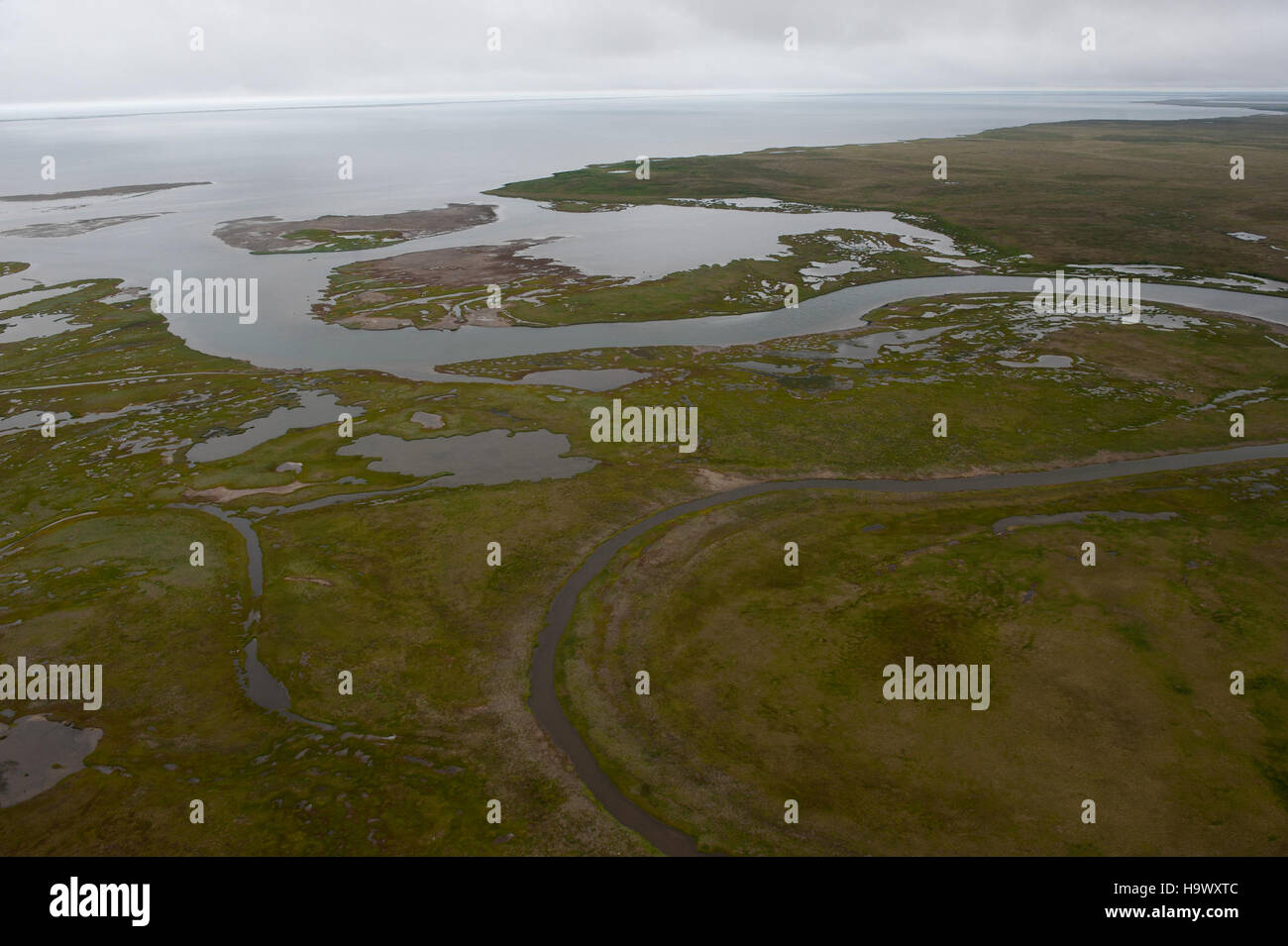 This photograph captures the rugged coast of the Bering Land Bridge ...