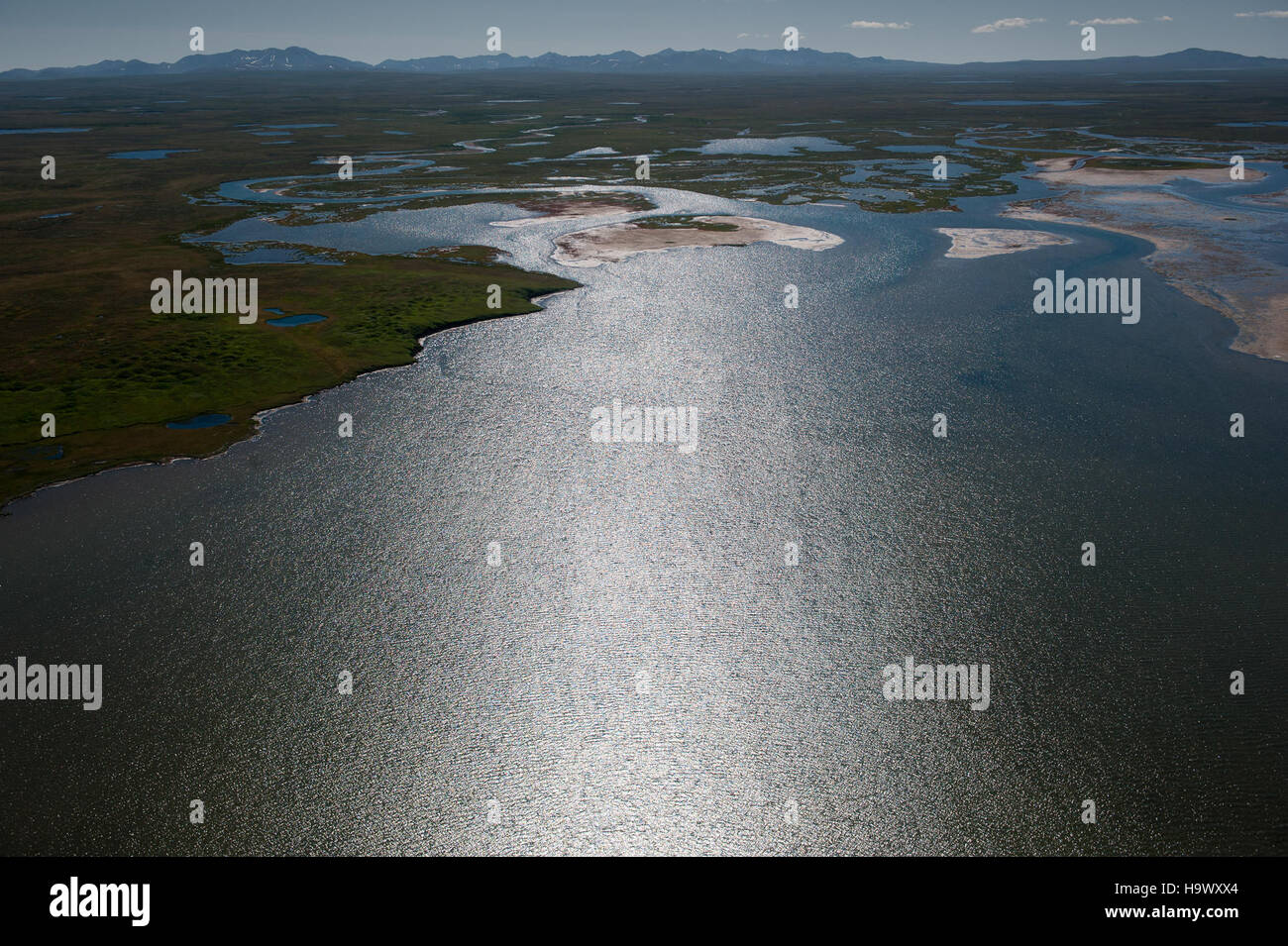 This photograph captures the serene and pristine beauty of Ikpek Lagoon ...
