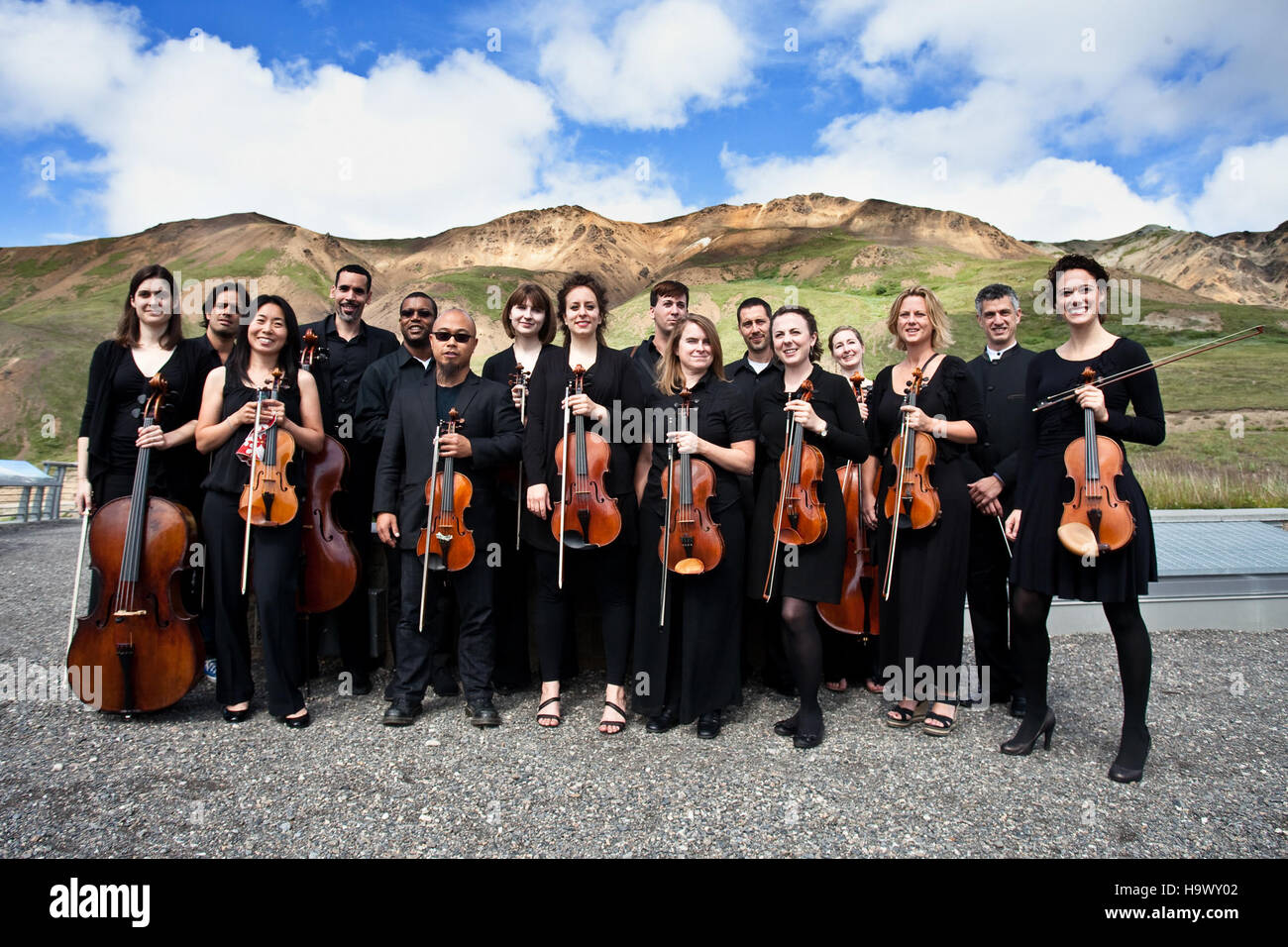 This photograph captures the FSAF String Orchestra in performance. The ...