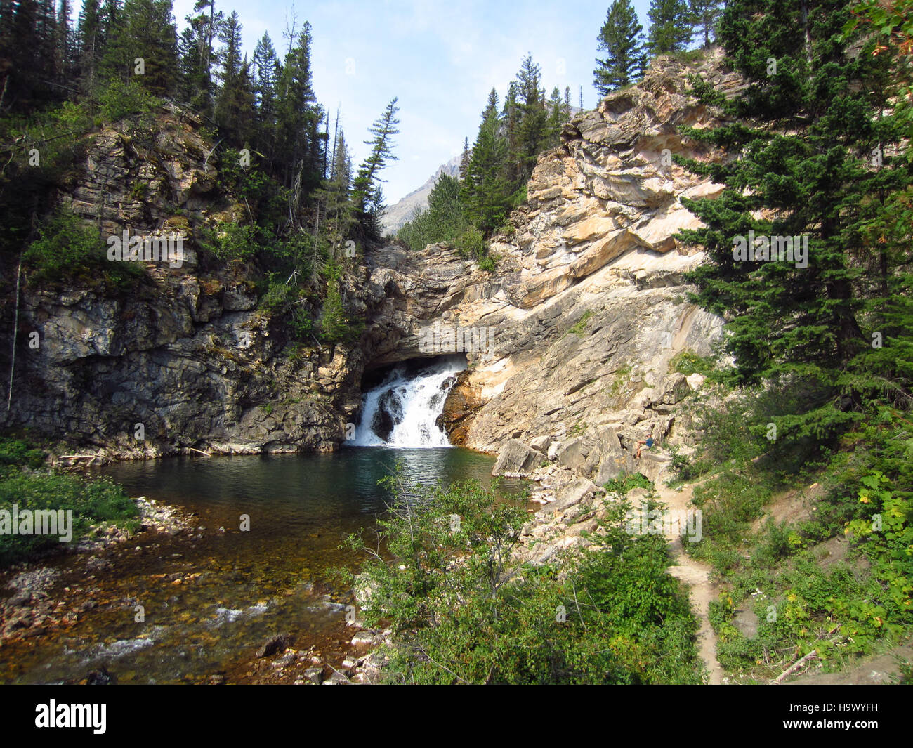 Running Eagle Falls, located in the Two Medicine Area of Glacier ...