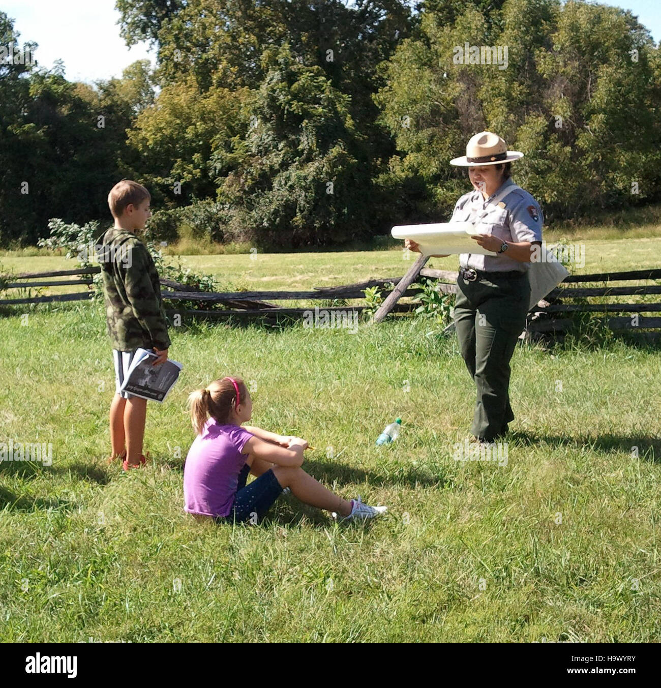 This image depicts visitors at Valley Forge National Park, engaging in ...
