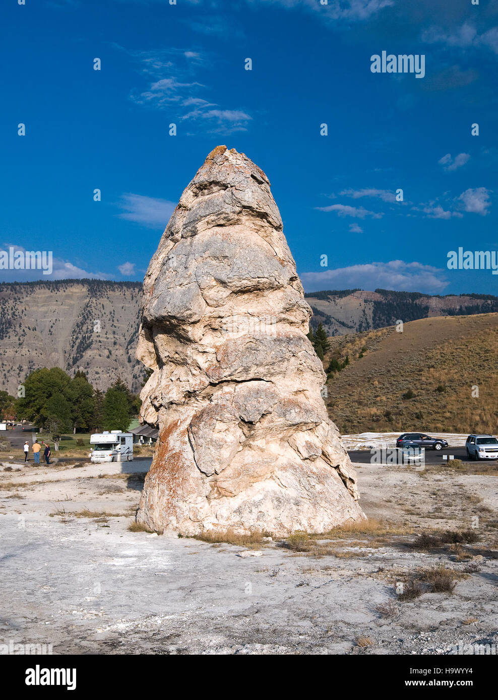 Liberty Cap, a striking geothermal feature at Mammoth Hot Springs in ...