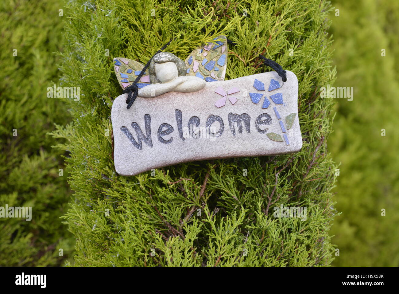 Garden, house fairy welcome sign Stock Photo - Alamy