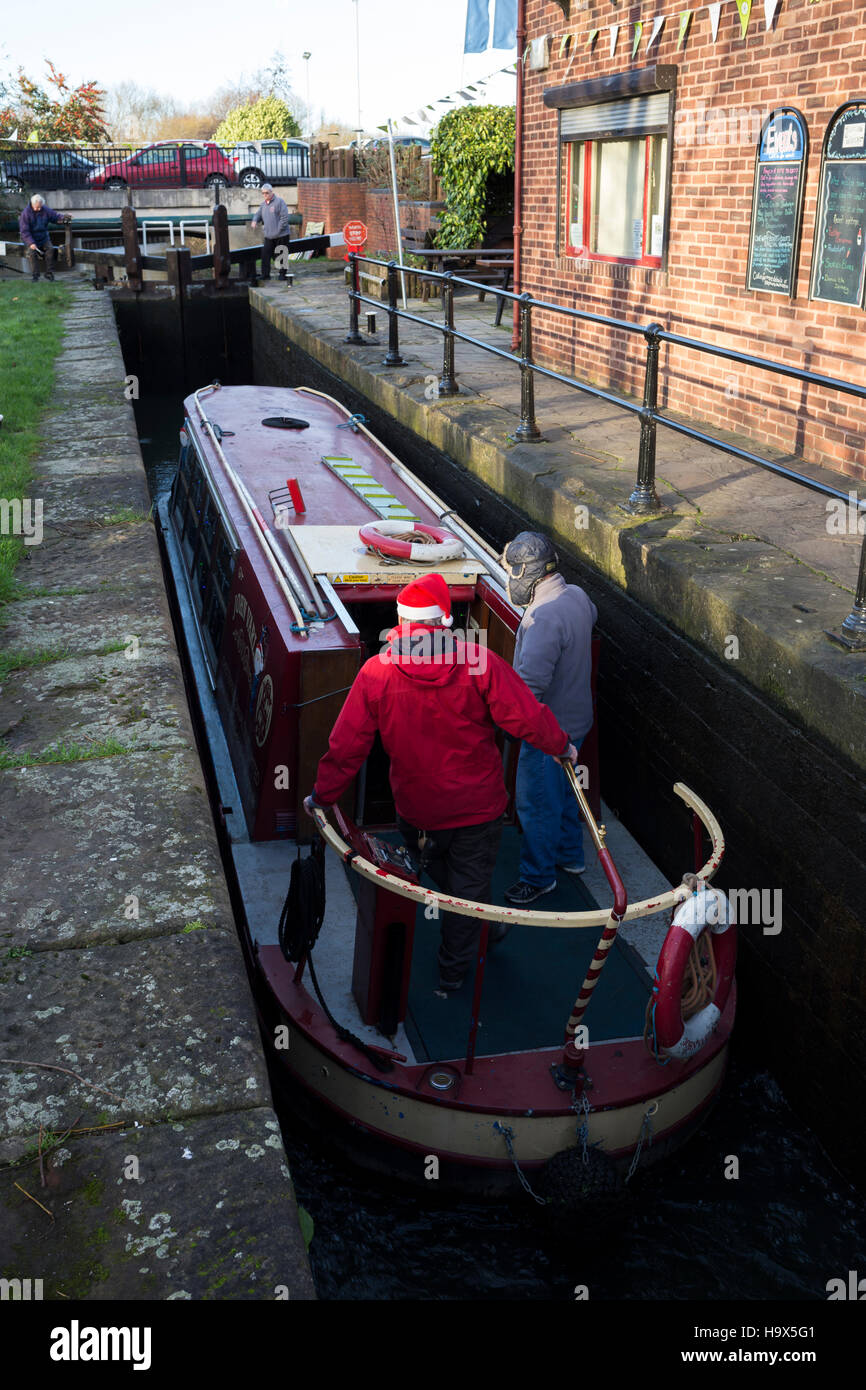 Canal barge lowering in lock Chesterfield Derbyshire England Stock ...