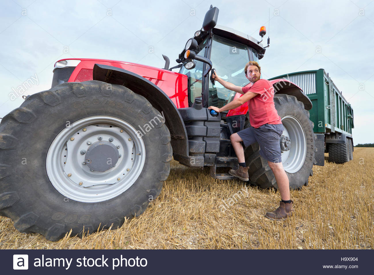Man Driving Tractor Stock Photos & Man Driving Tractor Stock Images - Alamy