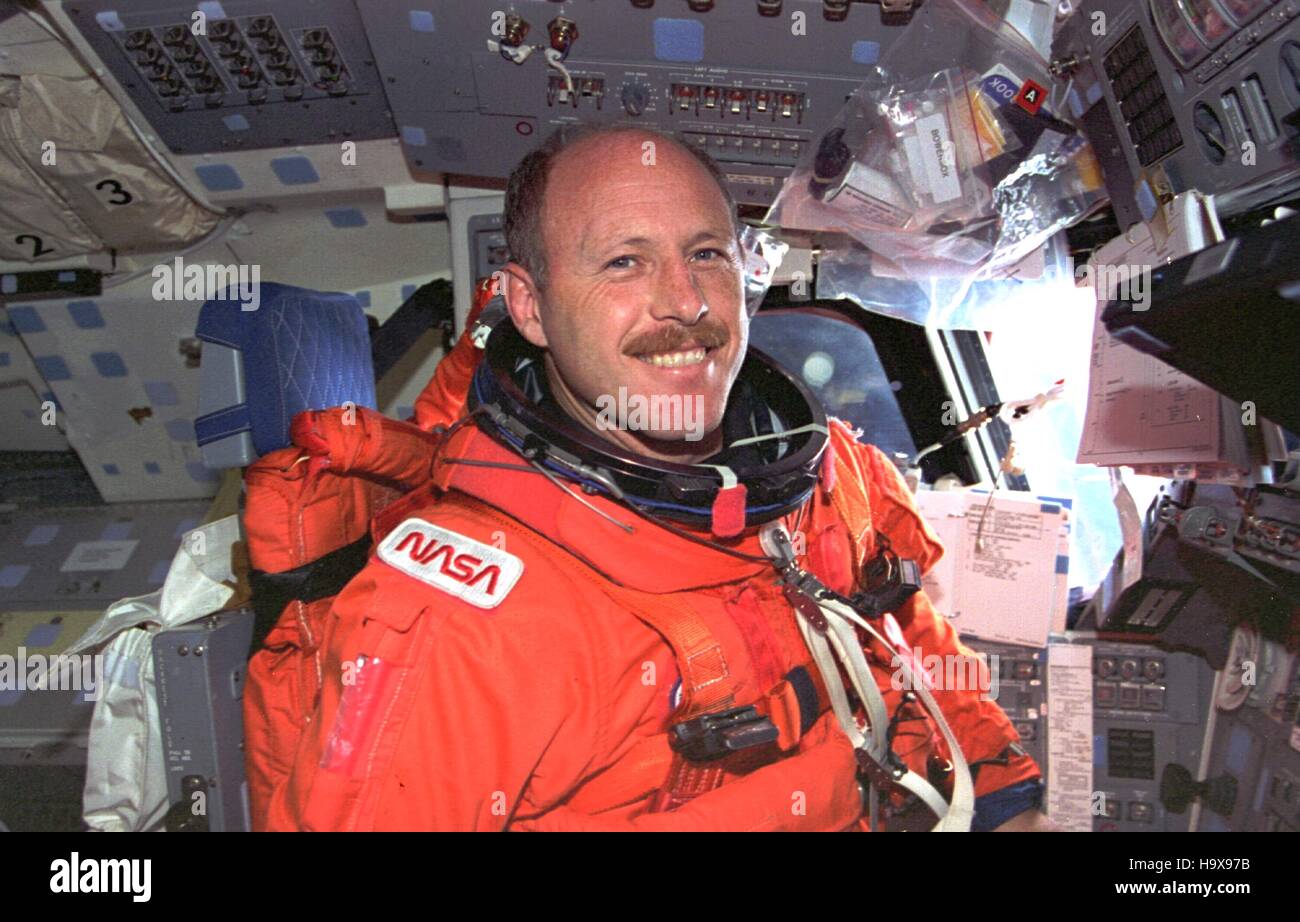 NASA STS-73 mission astronaut Ken Bowersox wears a shuttle launch and ...