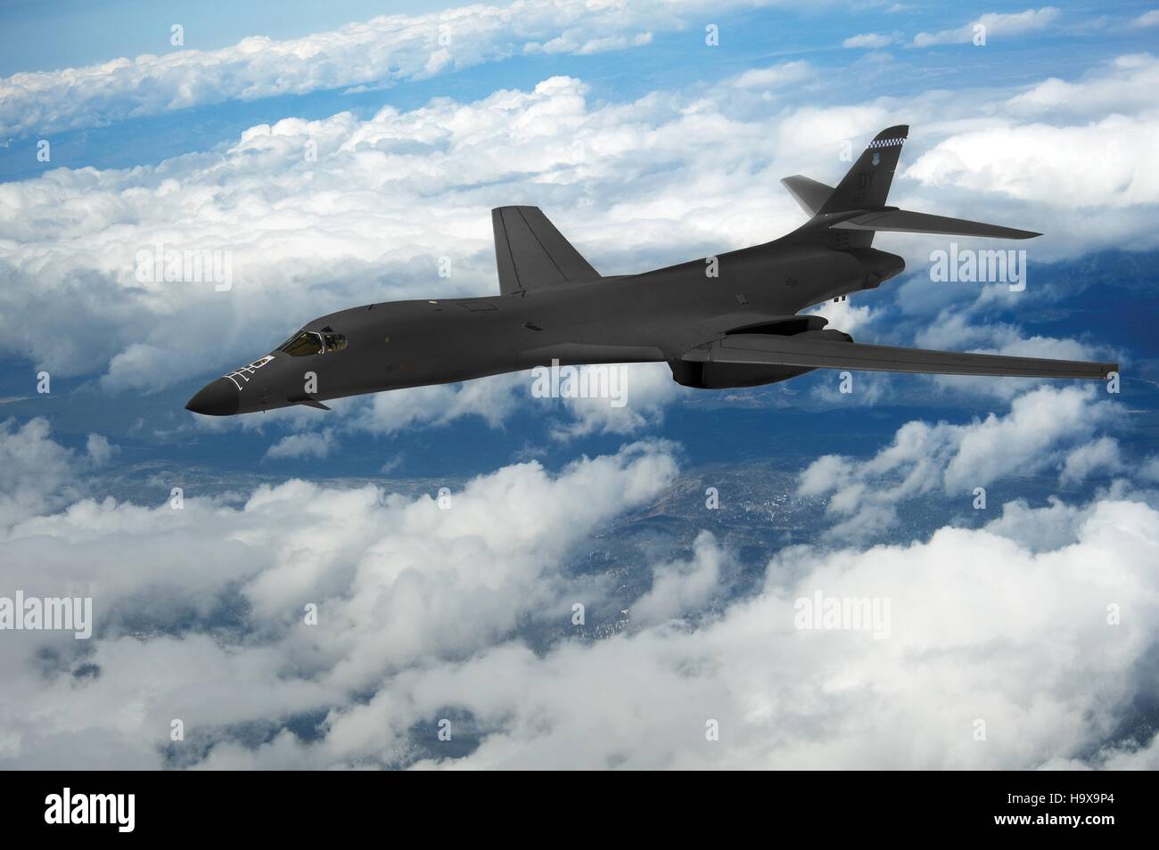 A B-1B Lancer jet-powered heavy strategic bomber aircraft flies above ...