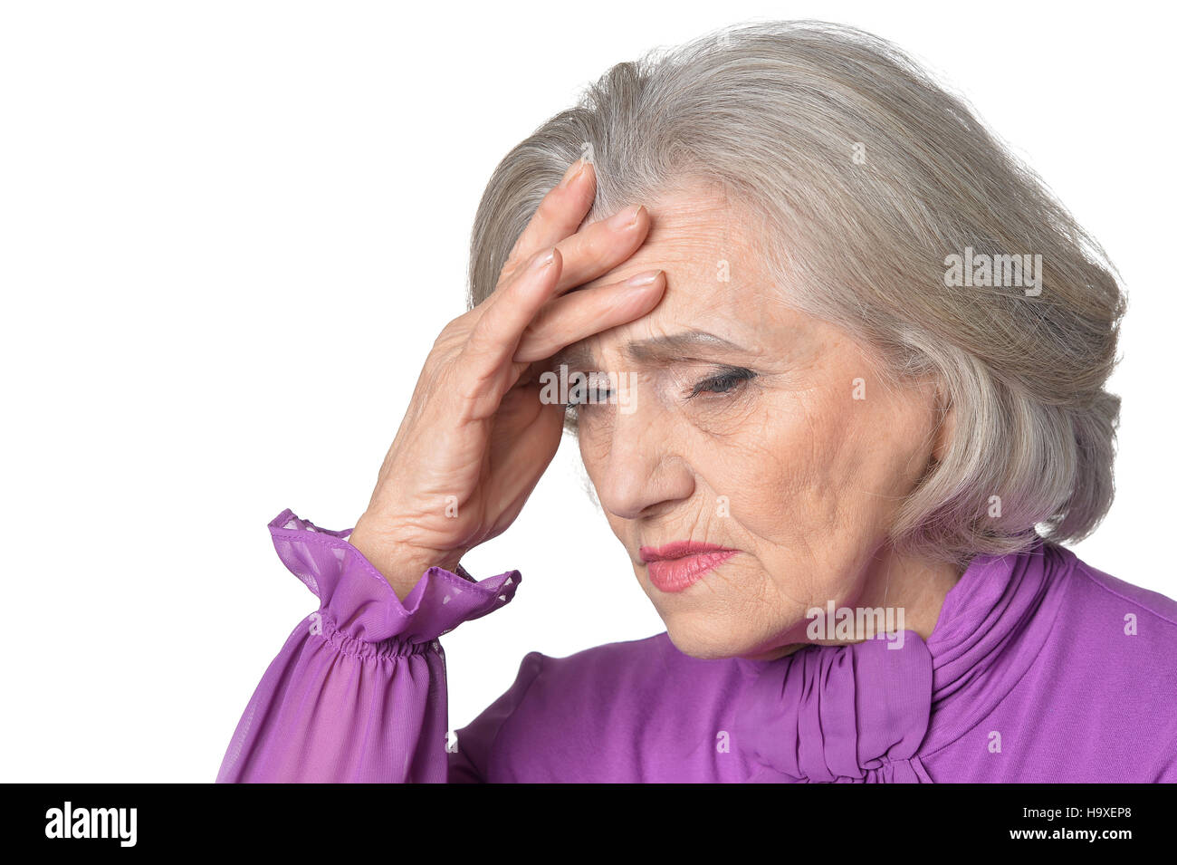 Sad senior woman Stock Photo - Alamy