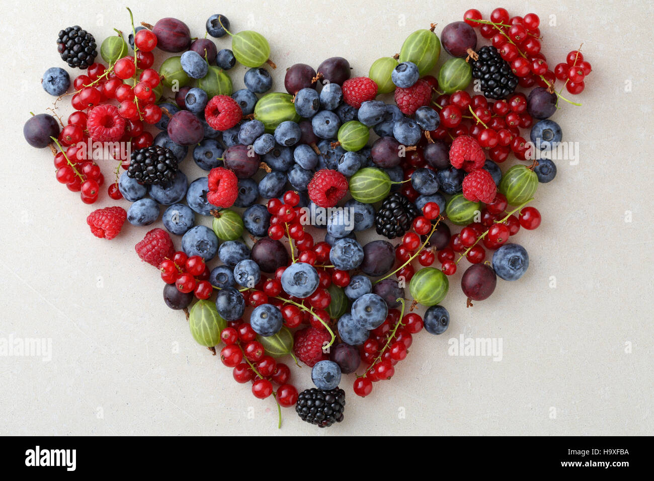 Fresh berries healthy lifestyle concept, love fruits Stock Photo - Alamy