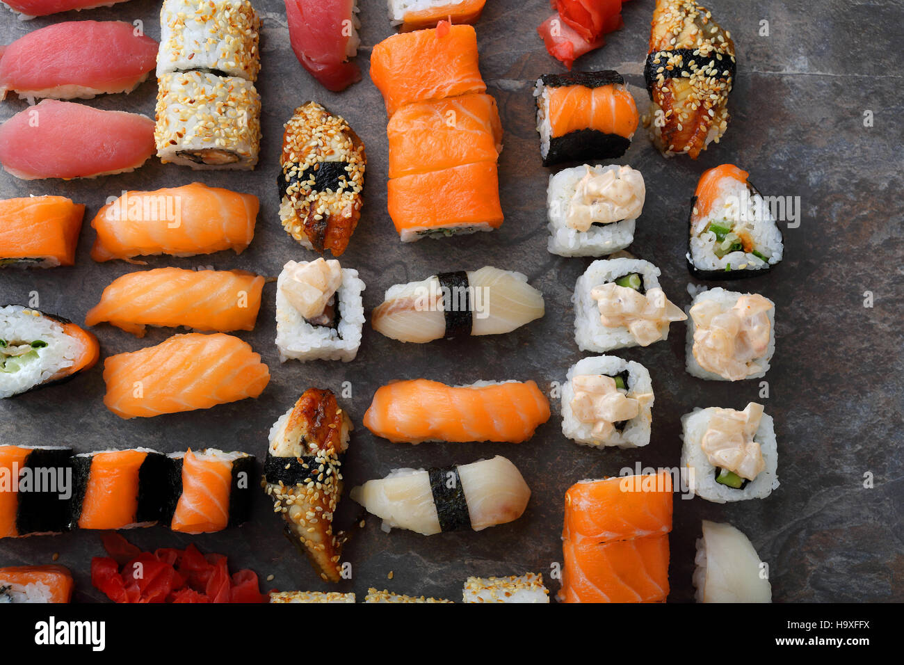 Traditional sushi set background, food top view Stock Photo - Alamy