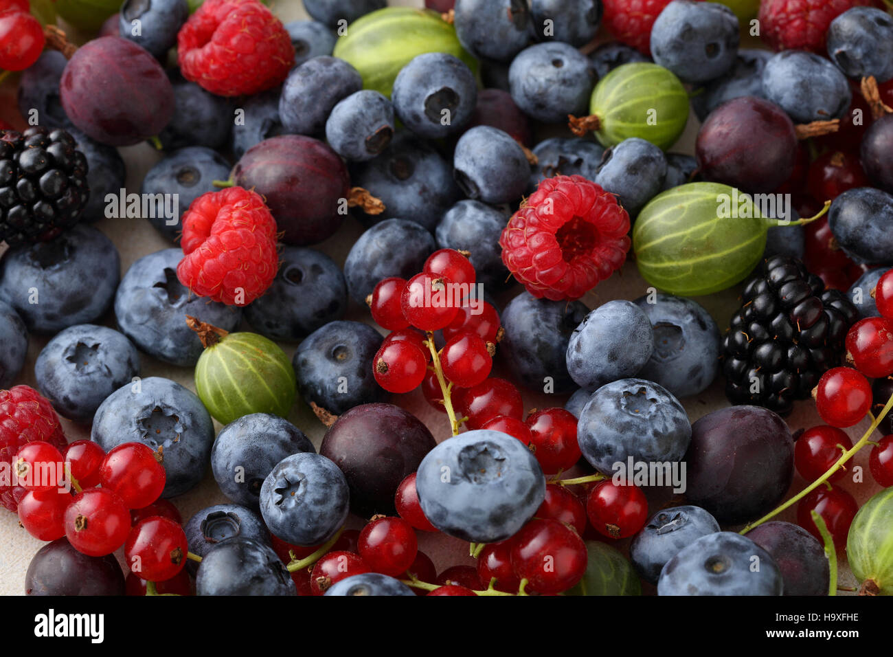 Summer berries mix background, food closeup Stock Photo - Alamy