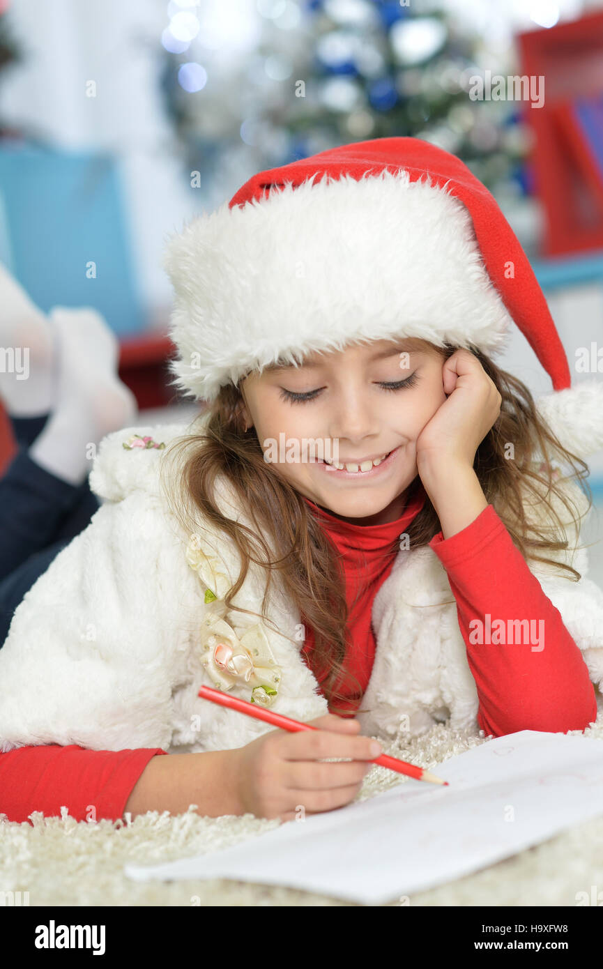 Little girl writing letter Stock Photo - Alamy