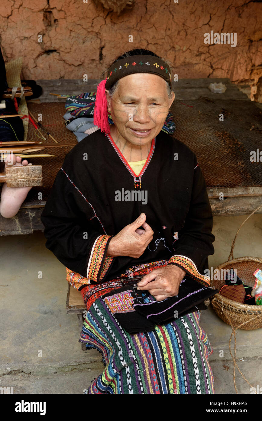 weaving in the Village Binlang of Li and Miao minorities near Sanya ...