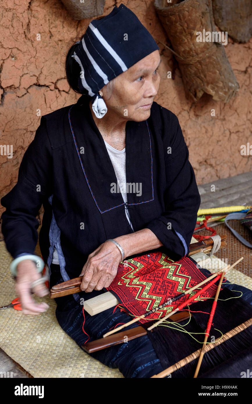 weaving in the Village Binlang of Li and Miao minorities near Sanya ...