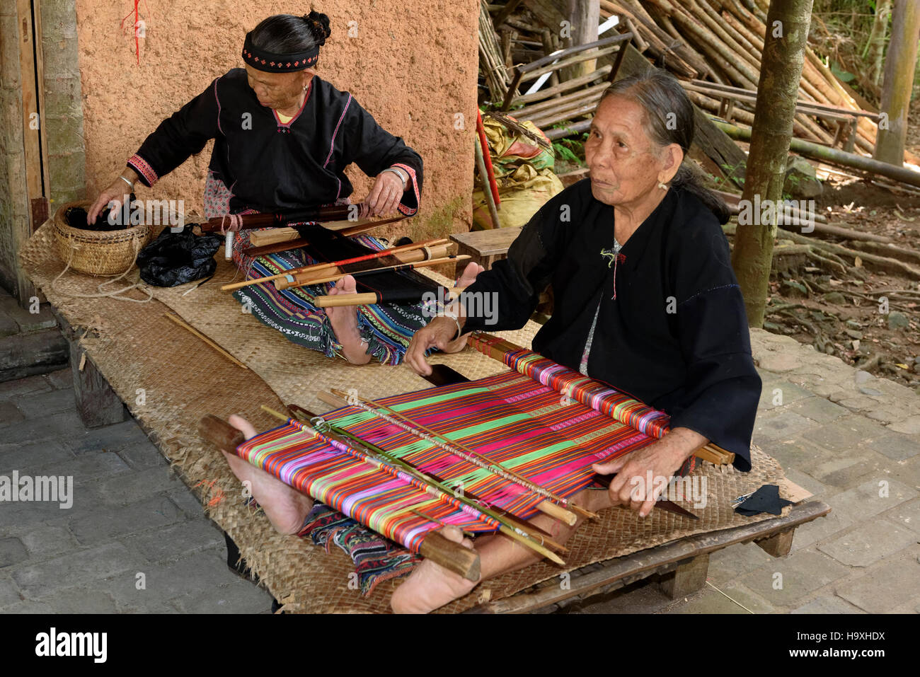 weaving in the Village Binlang of Li and Miao minorities near Sanya ...
