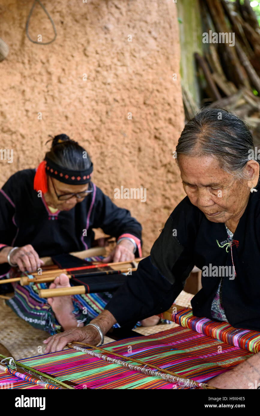 weaving in the Village Binlang of Li and Miao minorities near Sanya ...