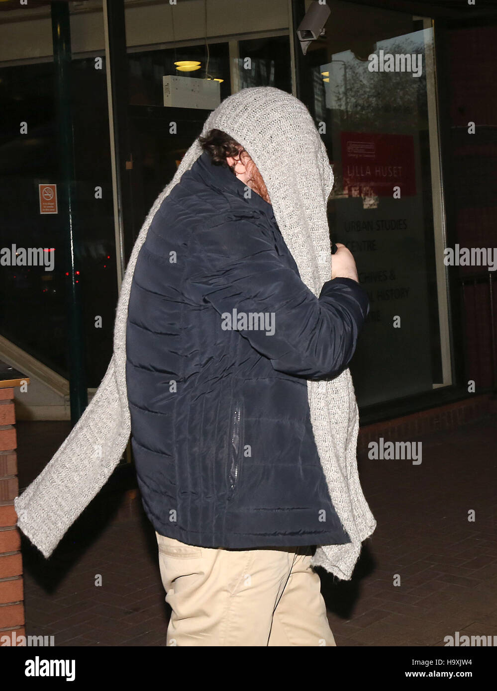 Jamie Penny covers his head as he leaves West London Magistrates court ...