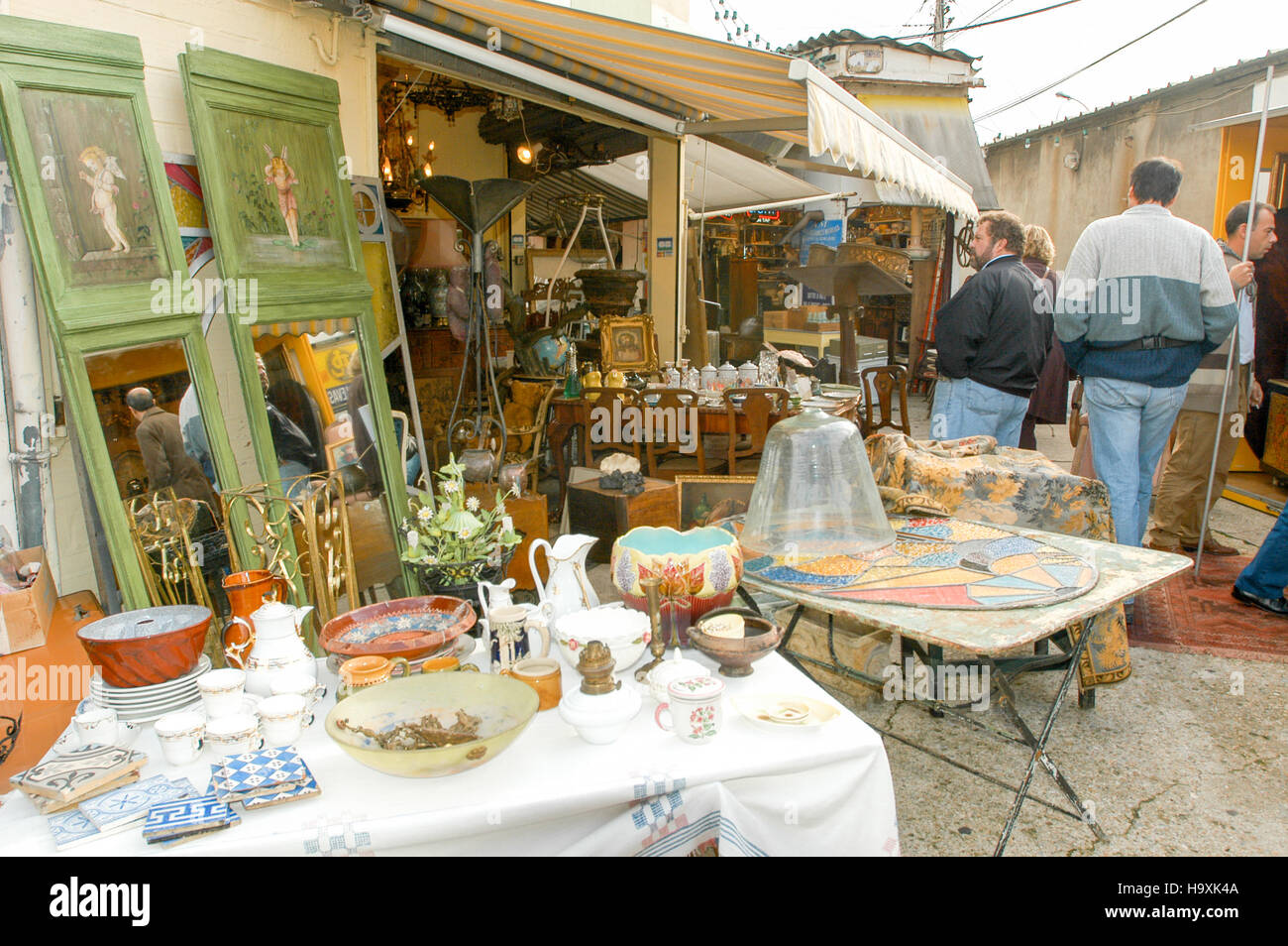 Paris, France - 3 November 2002: People shopping at the flea market of ...