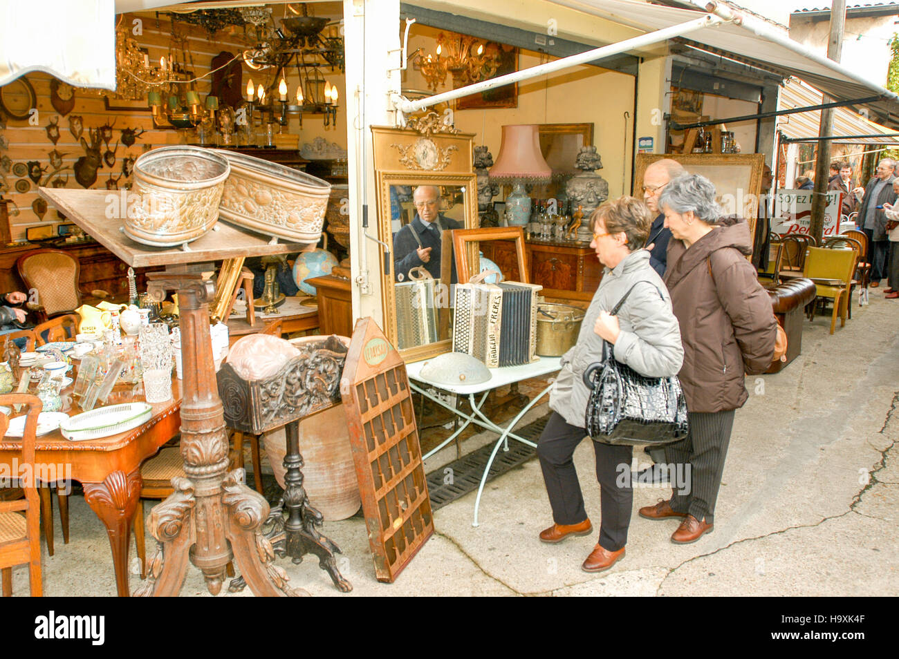 Paris, France - 3 November 2002: People shopping at the flea market of ...