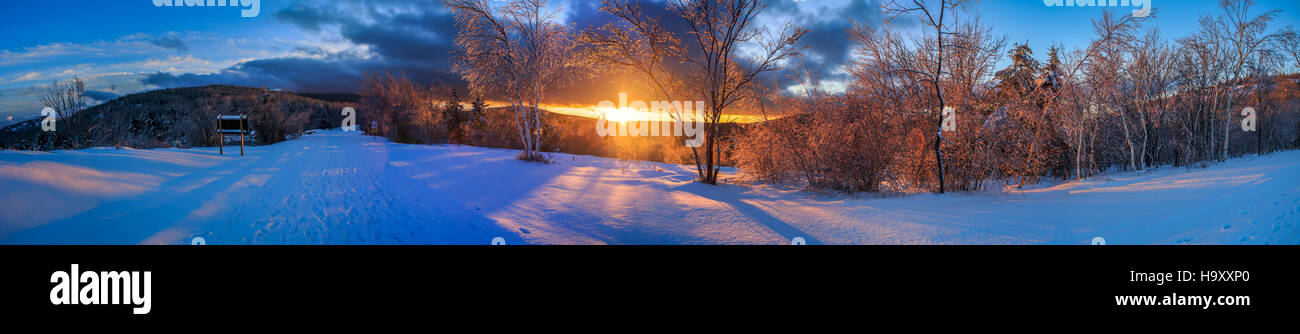 This image captures a scenic sunset over Park Loop Road, a popular route in a national park ...