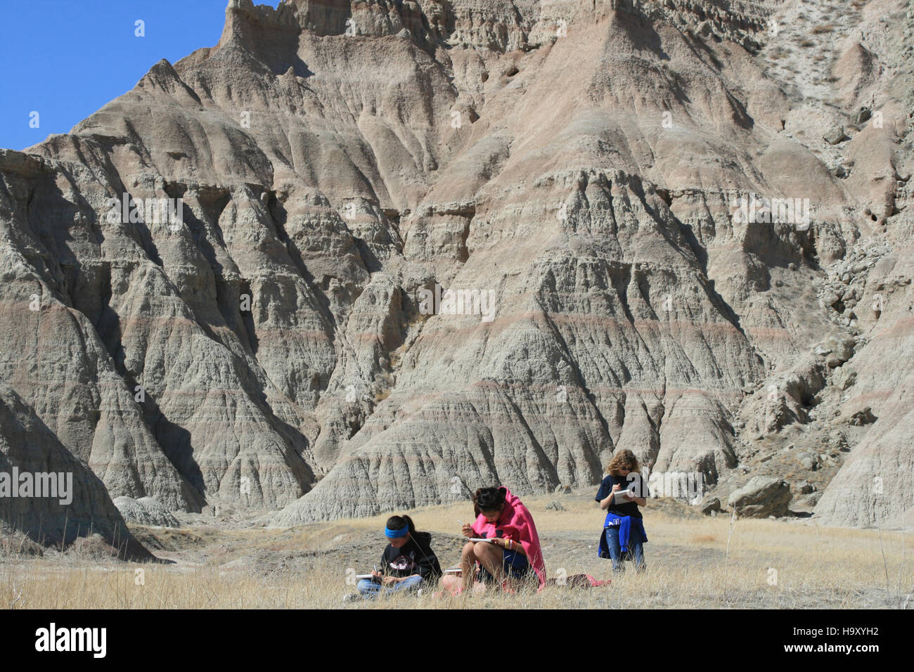 Students engage in nature journaling activities at Badlands National ...