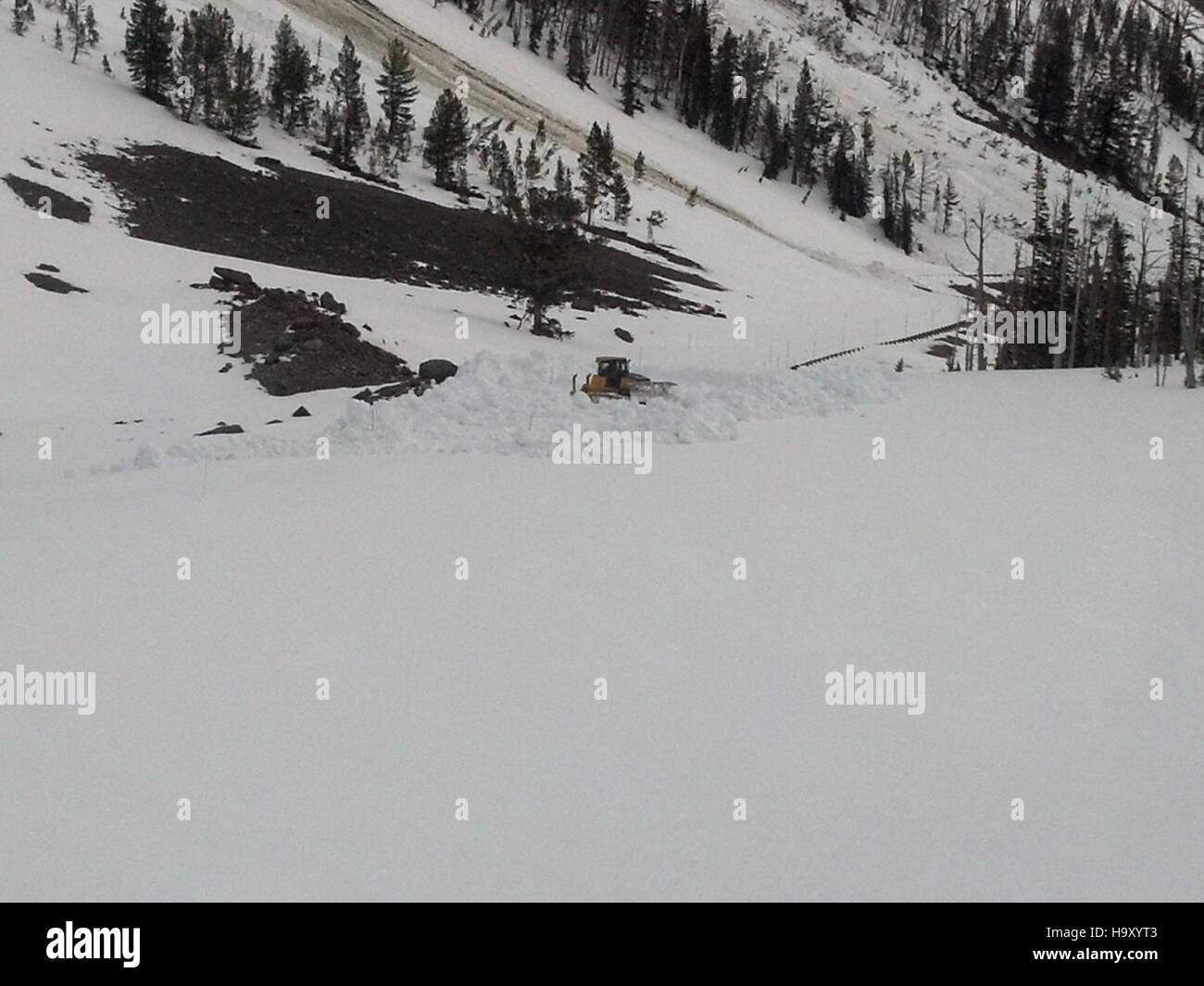 yellowstonenps 8619104495 WYDOT clearing of Sylvan Pass Stock Photo - Alamy
