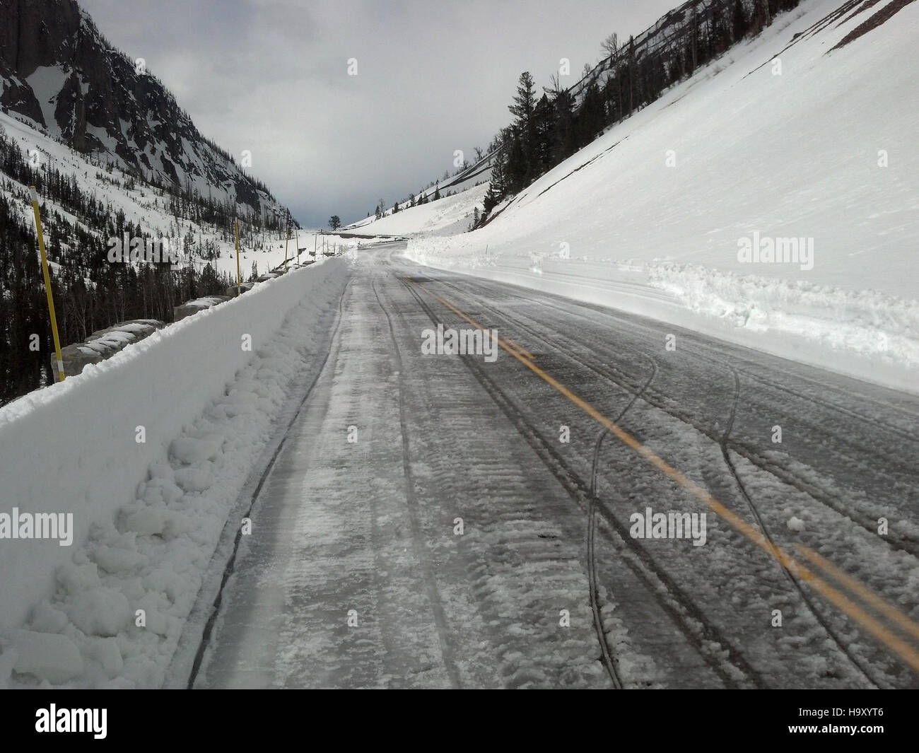 yellowstonenps 8619103899 WYDOT clearing of Sylvan Pass Stock Photo - Alamy