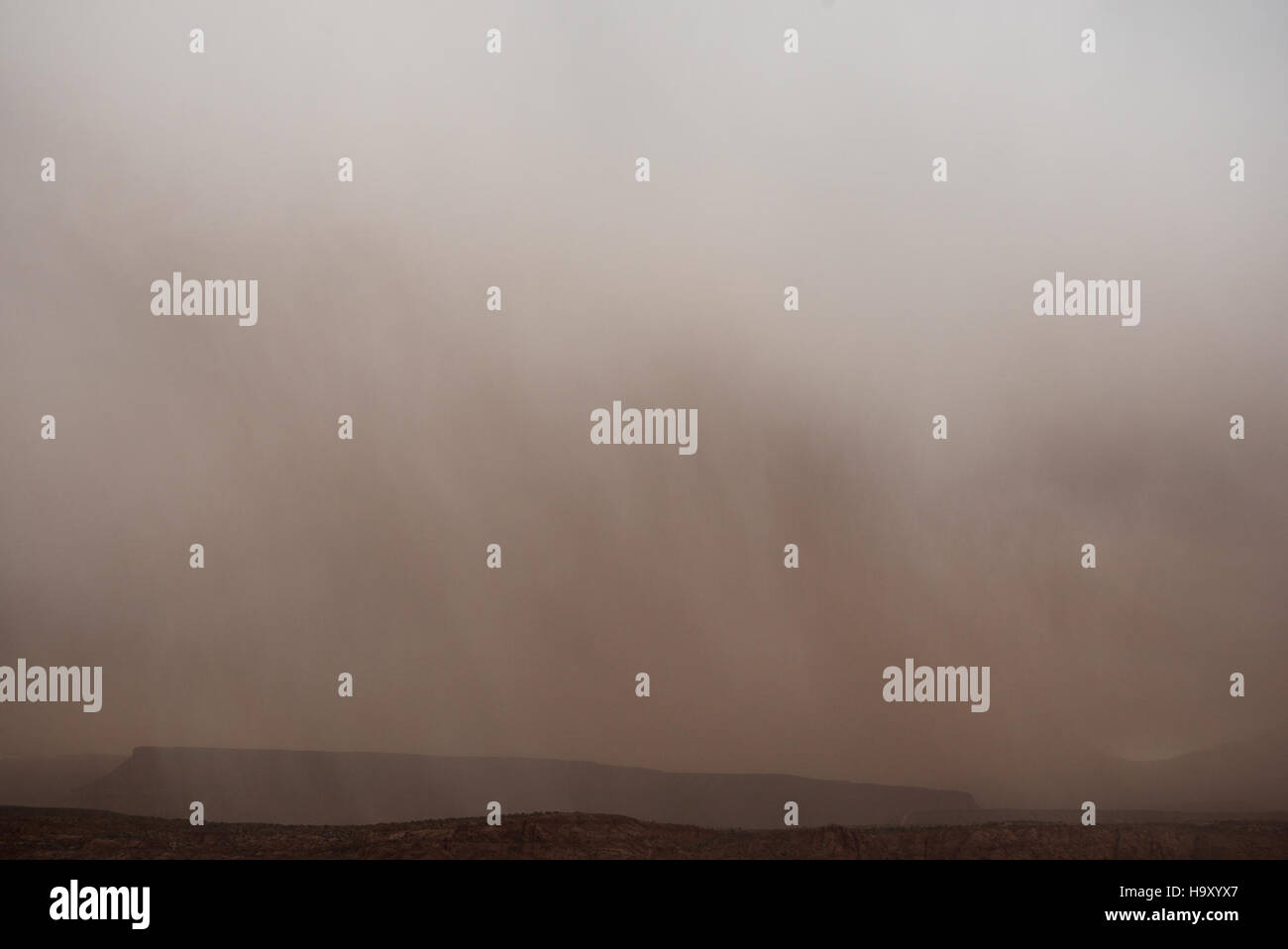 A view of the La Sal Mountains near Moab, where dust and rain obscure ...