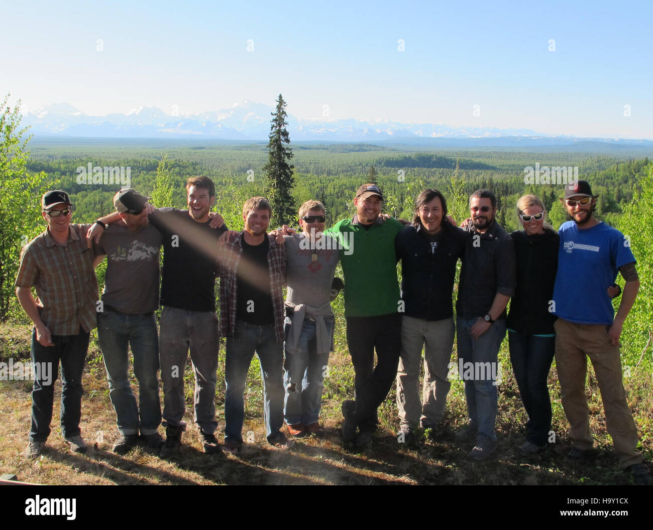 A group of visitors is led by guides through Denali National Park ...