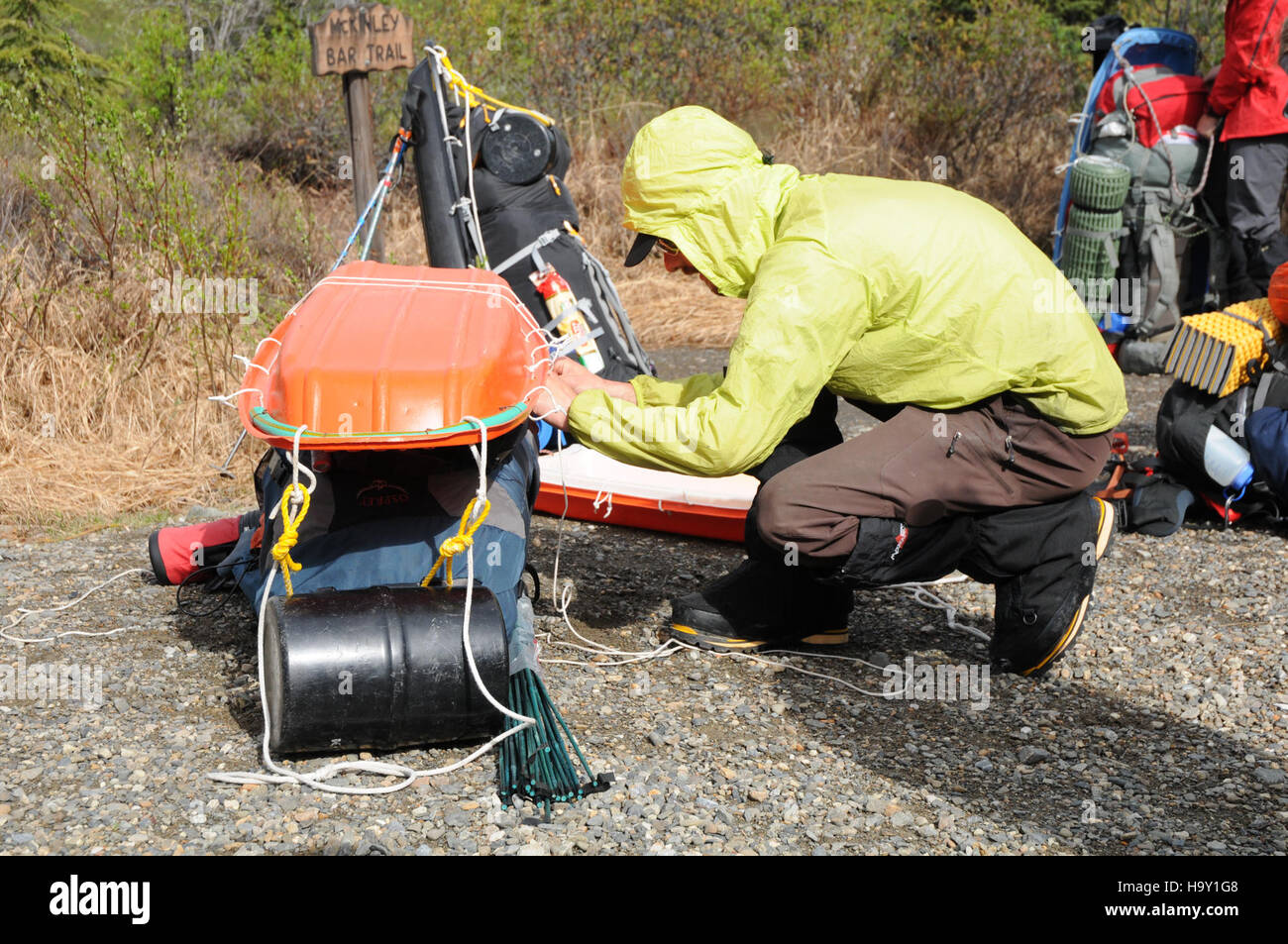 Park rangers and visitors prepare for a hiking expedition in Denali ...