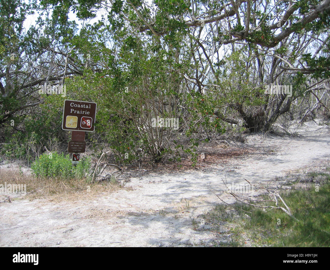 A sign marking the Coastal Prairie habitat at Everglades National Park ...