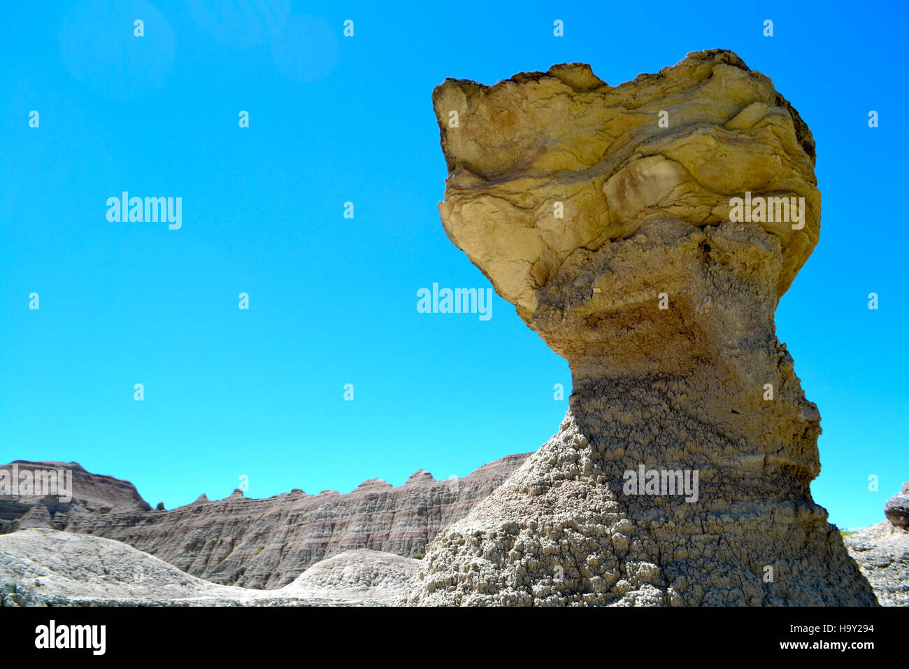 Toadstool Rock, a unique geological formation in Badlands National Park, offers visitors a ...