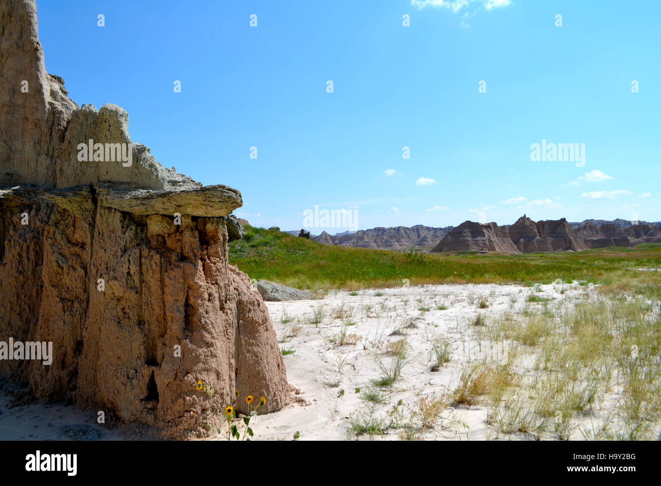 The Badlands National Park features a resistant layer of rock that ...