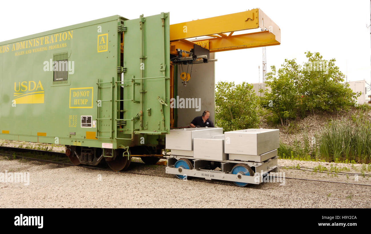 This image showcases a grain railroad scale used for measuring ...