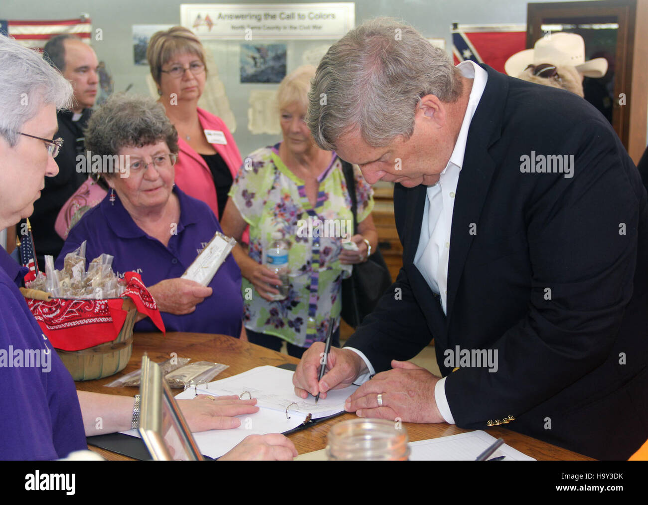 A ribbon-cutting event at the Iowa Immigration Museum marked the launch ...